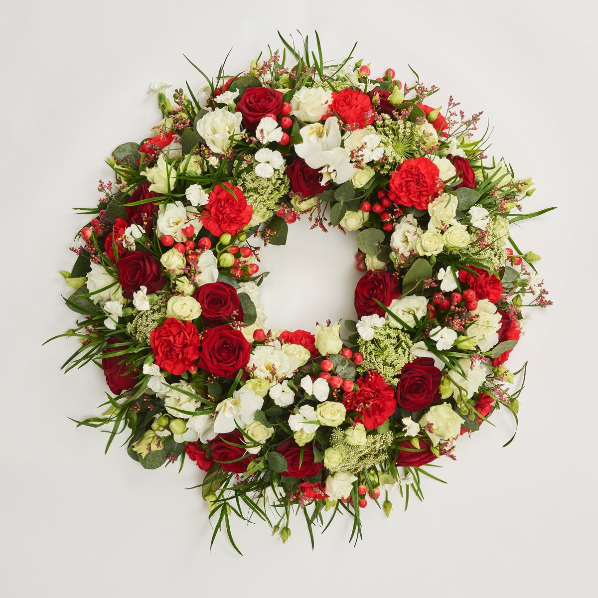 Bårebuket pris | Bestil bårebuketter og blomsterhjerter her